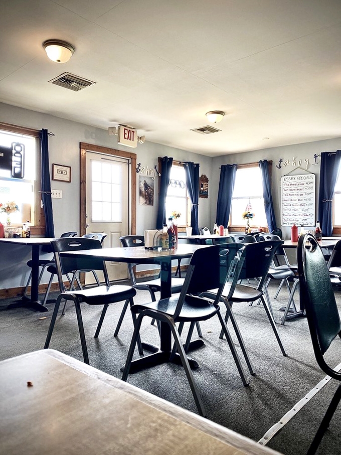 Inside, simplicity reigns supreme with navy curtains and practical furnishings &ndash; proof that extraordinary flavors don't require fancy surroundings.