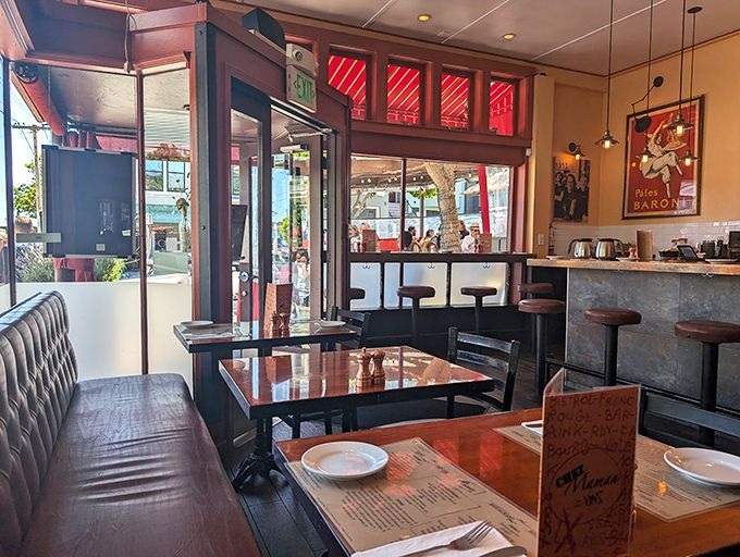 Inside, leather banquettes and vintage posters transport you to a bistro in the Marais. Just enough room to be cozy without feeling cramped.