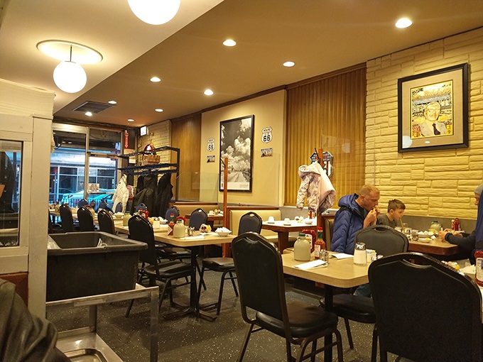 Inside Lou Mitchell's, time stands deliciously still. The warm lighting and bustling atmosphere create that rare alchemy where strangers become neighbors over breakfast. 