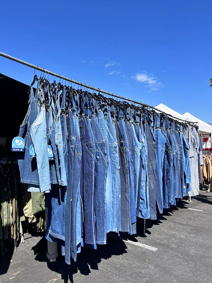 A sea of denim dreams hanging in perfect formation. Each pair tells a different story&mdash;some with more character than most Hollywood scripts.