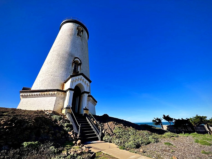 Standing tall since the 1870s, this beacon still guides ships while charming landlubbers with its timeless appeal.