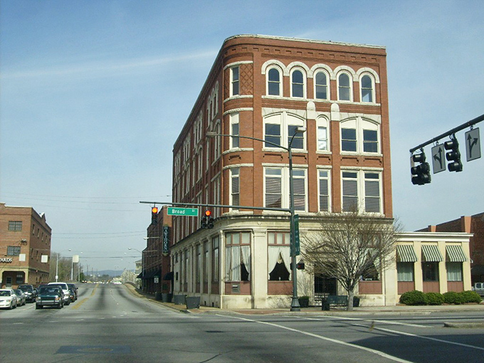 This corner building has witnessed more local gossip and first dates than a barber shop and matchmaker combined. Classic small-town America at its finest.