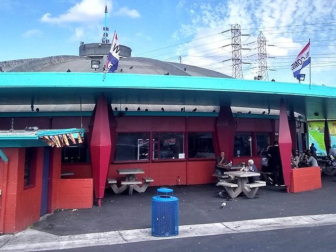 This retro-styled snack bar, with its turquoise roof and brick-red walls, offers the perfect refueling station after hours of deal-hunting adventures.