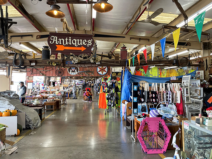 Antiques alley stretches as far as the eye can see, where yesterday's treasures await new homes and colorful pennants guide your journey.