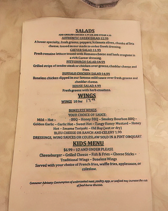 A menu that reads like a love letter to comfort food classics. No molecular gastronomy here—just honest dishes that deliver satisfaction.