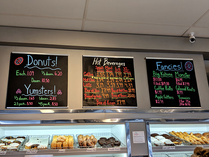 Behold the menu board of dreams! Where "Yumsters" aren't just pastries but an entire philosophy of deliciousness spelled out in colorful chalk.