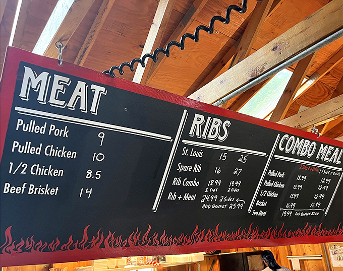 Meat, ribs, and combo meals laid out like a carnivore's dream playlist. This chalkboard menu isn't just a list—it's a roadmap to happiness with prices that won't make your wallet weep.