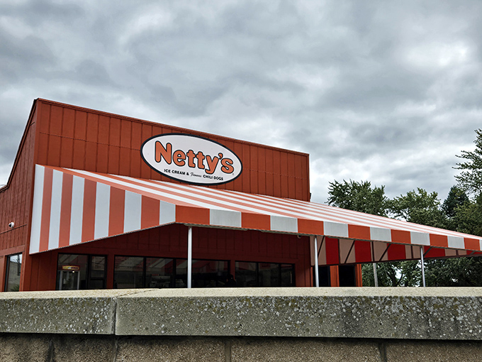 That orange-and-white awning works like a beacon for hungry Ohioans, promising comfort food that hasn't changed since your first visit decades ago.