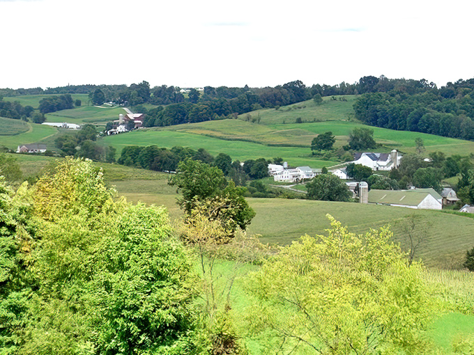 The quintessential Amish Country landscape unfolds like nature's quilt &ndash; patches of farmland, forest, and homesteads stitched together with country roads.