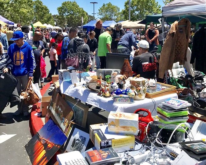 The weekend crowd navigates this sea of potential discoveries. One person's castoffs become another's conversation pieces in this bustling marketplace.