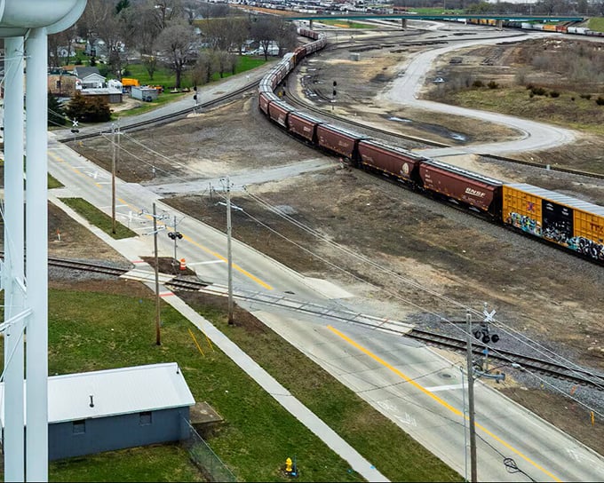 The quintessential Galesburg experience: watching freight trains snake through town like mechanical rivers, carrying America's goods while locals carry on with affordable living.