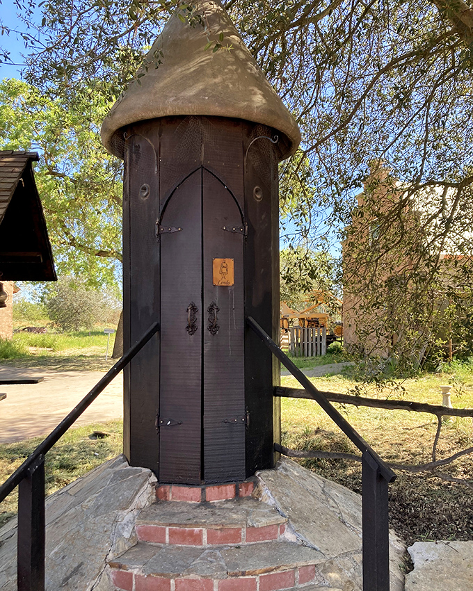 Not your average garden shed! This whimsical guard tower looks like it was plucked straight from a Monty Python sketch about the world's most adorable fortress.