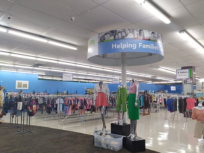 A shopper's paradise awaits under the "Helping Families" banner, where mannequins model possibilities and racks burst with color-coded potential.