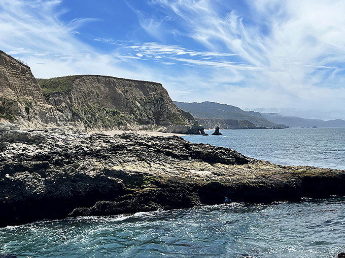 The Pacific puts on its daily performance against these majestic cliffs. No ticket required, just a willingness to be awestruck.