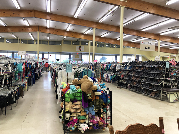 Exposed wooden beams watch over a textile ocean of possibilities. The thrill of the hunt begins where the racks seem endless.