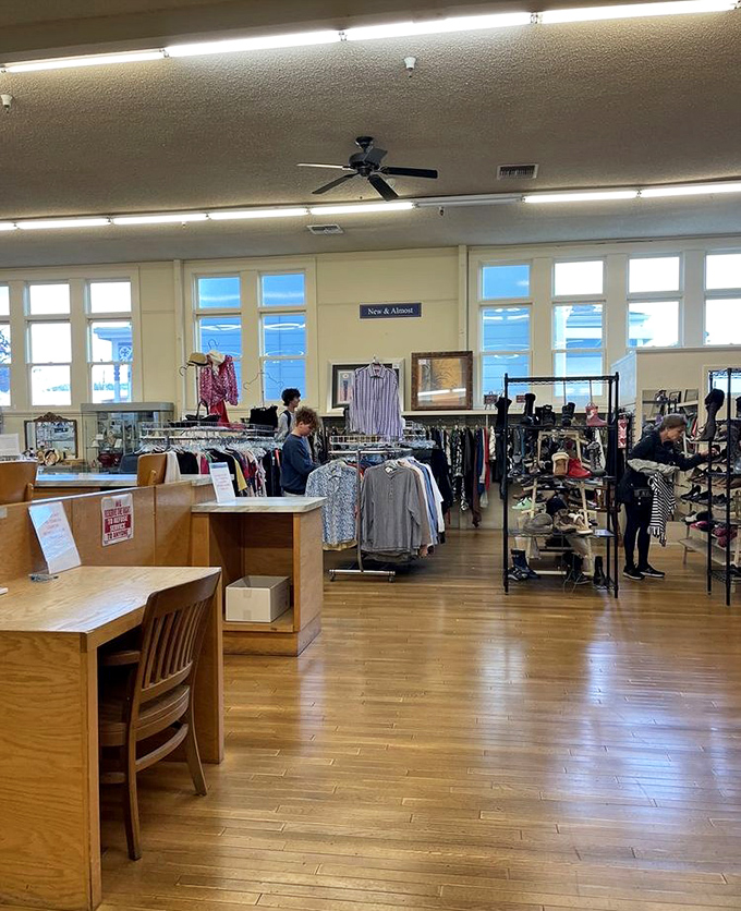 Bright windows flood the spacious interior with natural light, creating a shopping experience that feels more boutique than bargain basement.