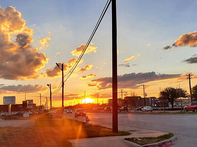 Texas sunsets don't just happen&mdash;they perform. This golden hour spectacle transforms ordinary streets into pathways paved with liquid amber.