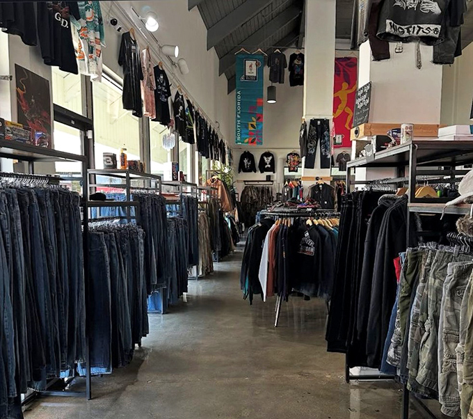 Racks stretch endlessly like a clothing lover's fever dream, organized chaos at its absolute finest.