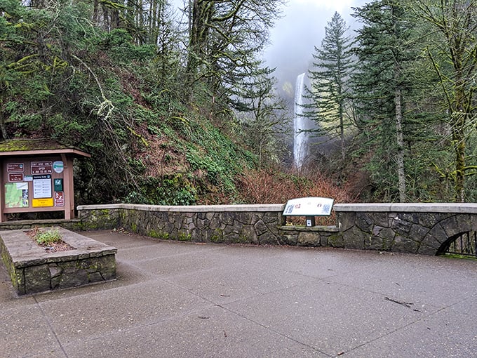 The welcoming committee: This stone viewpoint offers your first tantalizing glimpse of the falls, like nature's version of a movie trailer that promises an epic feature.