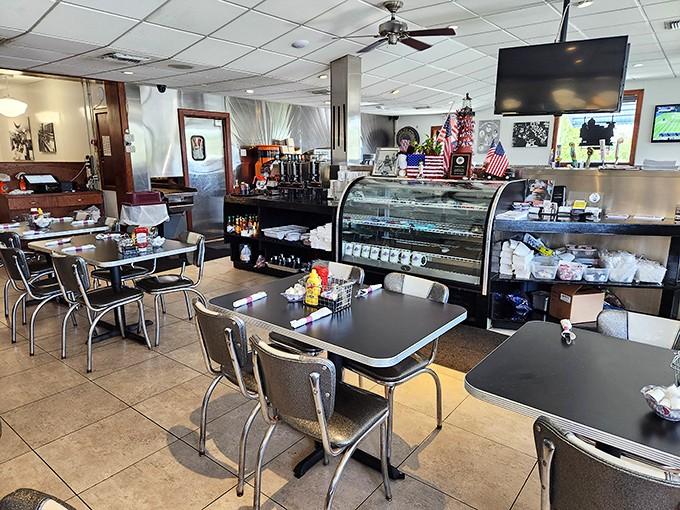 Classic diner vibes meet modern comfort in this welcoming space where every seat feels like home.