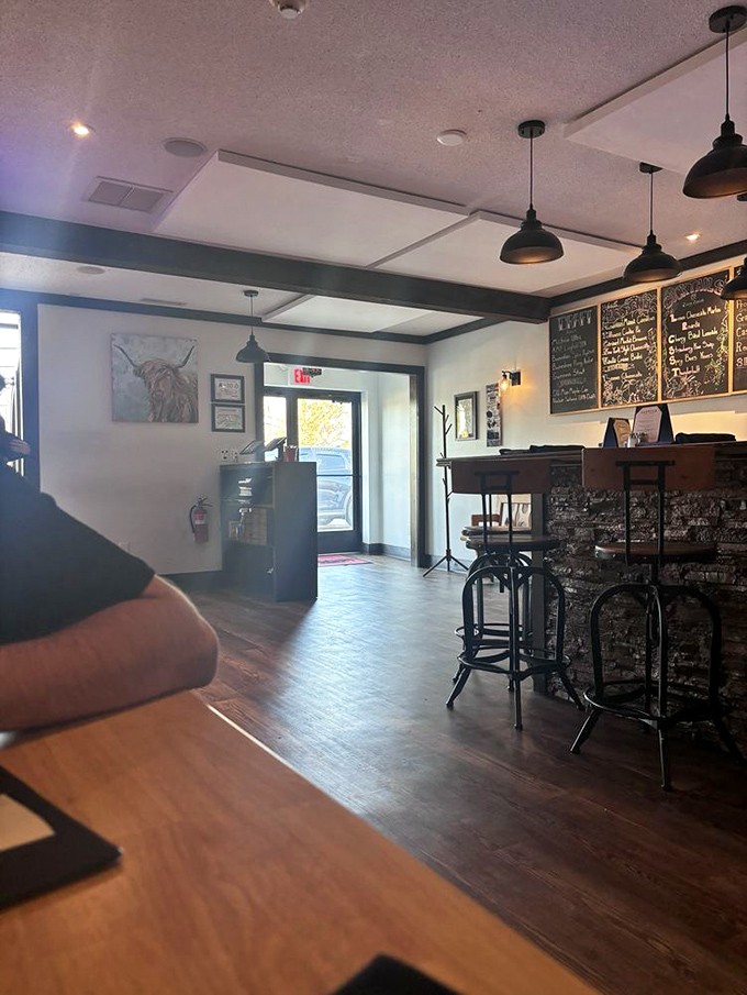 Step inside to a world where rustic charm meets culinary excellence. The warm wood tones and pendant lighting create the perfect atmosphere for meat-loving memories.