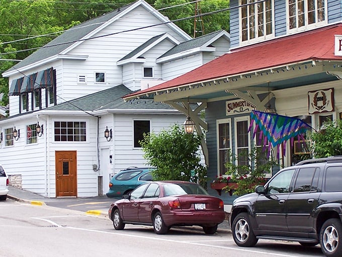 Fish Creek's charming storefronts look like they're auditioning for a Hallmark movie set, complete with flower boxes that could win gardening awards.