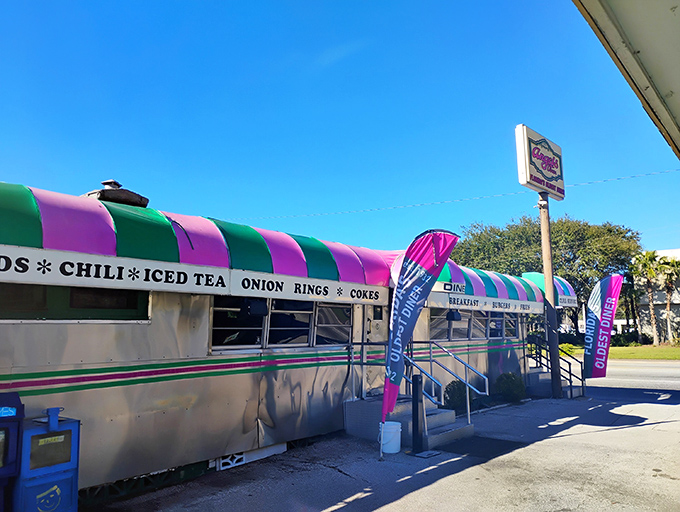 This purple and green beauty looks like a time machine disguised as a dining car.