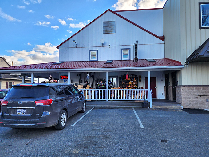 Bird-in-Hand Bakeshop stands proudly against the Pennsylvania sky, a white barn where Amish baking traditions are still alive and kicking.