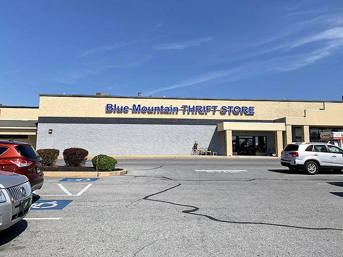 Blue Mountain Thrift Store sprawls invitingly under clear skies. This bargain hunter's paradise promises adventures in affordable retail therapy.