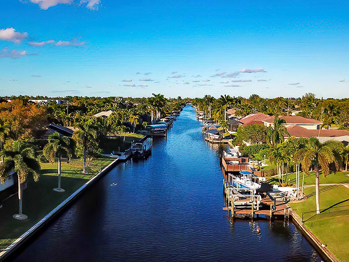 Cape Coral's canal system puts Venice to shame, offering waterfront living where your fishing rod might be more active than your retirement account.