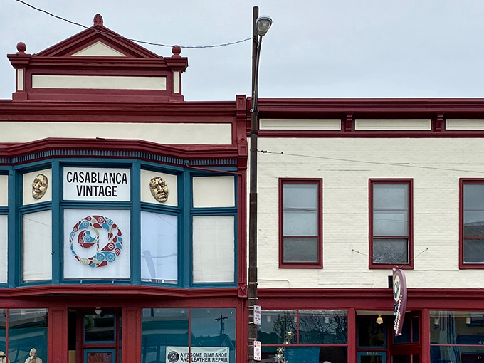 Those vintage storefront windows whisper stories of fashion decades past, waiting to be rediscovered.