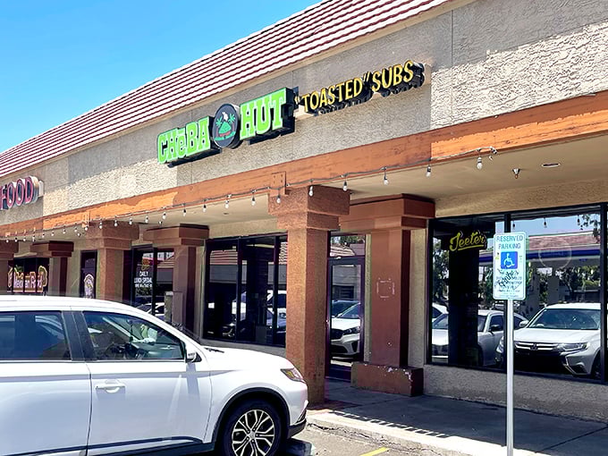 Cheba Hut's vibrant green signage stands out like the life of the party. Their toasted subs are about to change your sandwich standards forever.