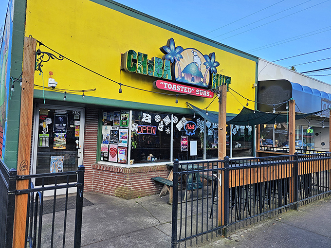Cheba Hut's vibrant yellow facade is like sunshine on a cloudy day, promising toasted subs that'll make your taste buds dance.