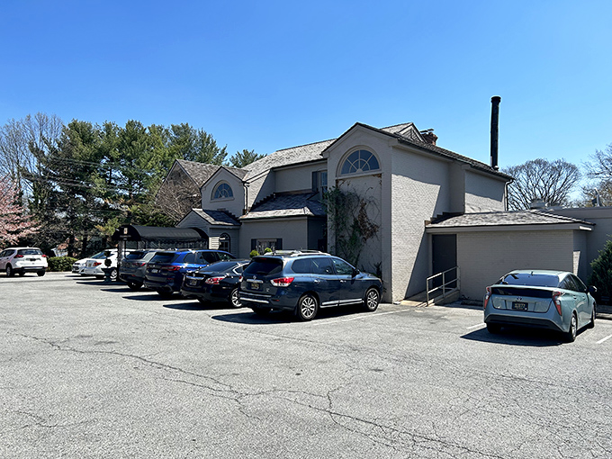 Elegant brick and white trim hint at the culinary sophistication within. Like a country club that actually wants you to enjoy yourself.