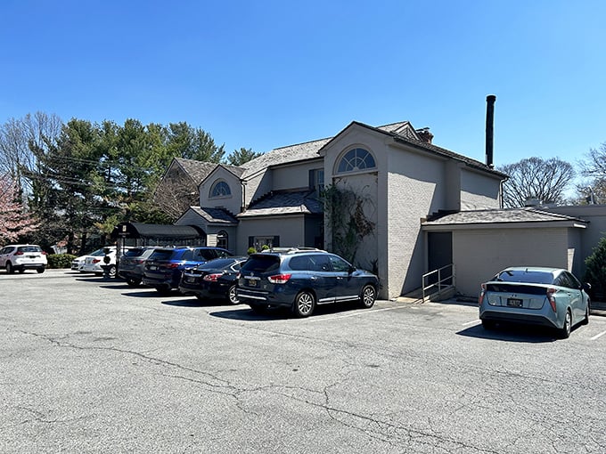 Elegant brick and white trim hint at the culinary sophistication within. Like a country club that actually wants you to enjoy yourself.