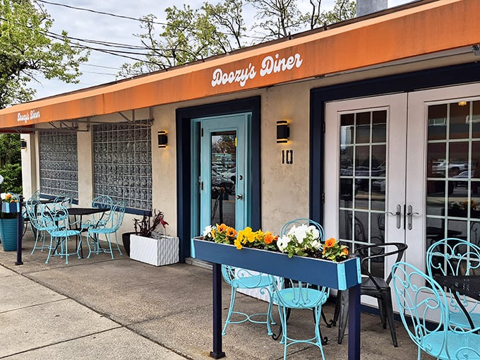 Doozy's turquoise chairs and bright blue door say "come on in" louder than any neon sign ever could.