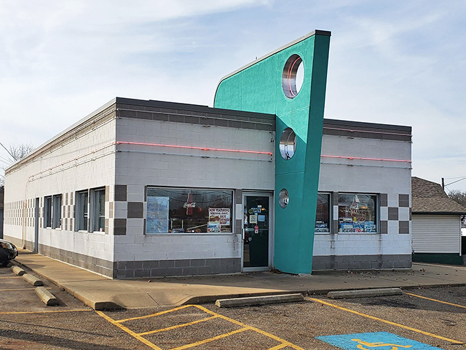 Doug's Classic '57 sports that unmistakable teal fin &ndash; architectural proof that food just tastes better when served with a side of nostalgia.