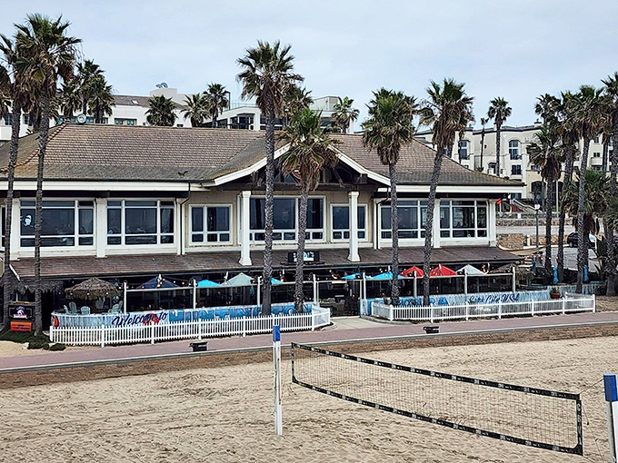 Beach volleyball nets in the foreground, ocean views all around. Duke's brings Hawaiian aloha spirit right to Huntington's famous shoreline.