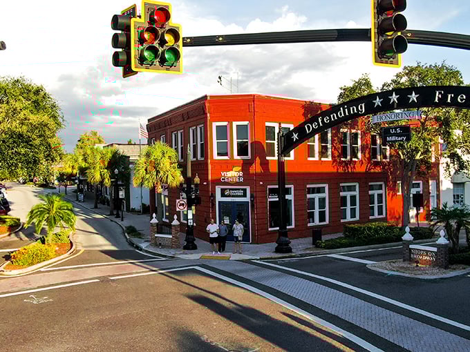 Dunedin's "Defending Freedom" arch welcomes visitors to a downtown where palm trees and patriotism stand side by side.