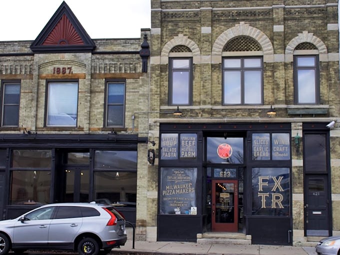 Fixture Pizza Pub's historic brick fa&ccedil;ade houses Milwaukee pizza magic. That "FXTR" sign might as well say "Enter here for happiness."