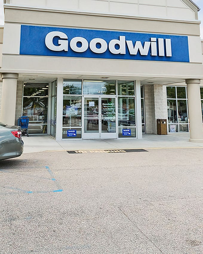 The classic blue Goodwill sign promises treasure hunting adventures for savvy Virginia shoppers on a budget.