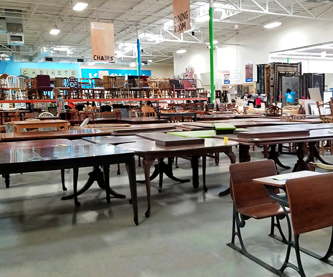 Dining tables stretch into the distance at Habitat ReStore&mdash;more options than a restaurant hostess could handle!