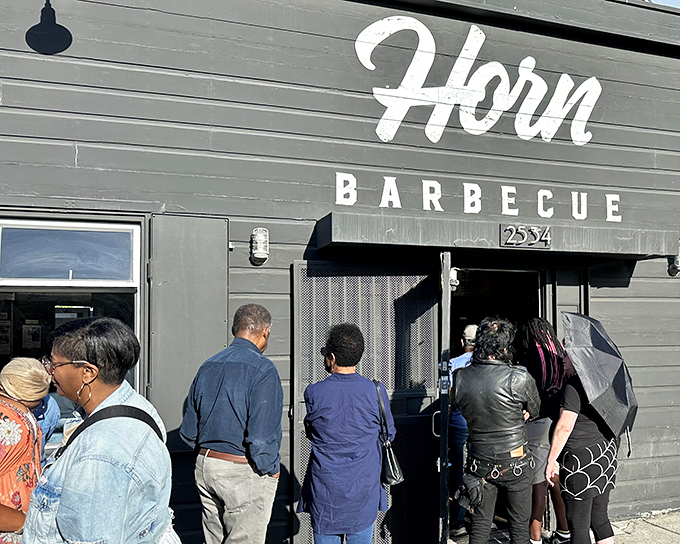 Horn Barbecue's unassuming gray exterior hides smoky treasures within. Like finding a pirate's chest, but the gold is brisket.