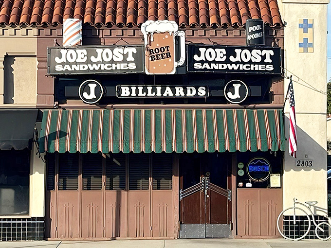 Joe Jost's vintage storefront looks like a movie set, but those pool tables and legendary dogs are deliciously real.