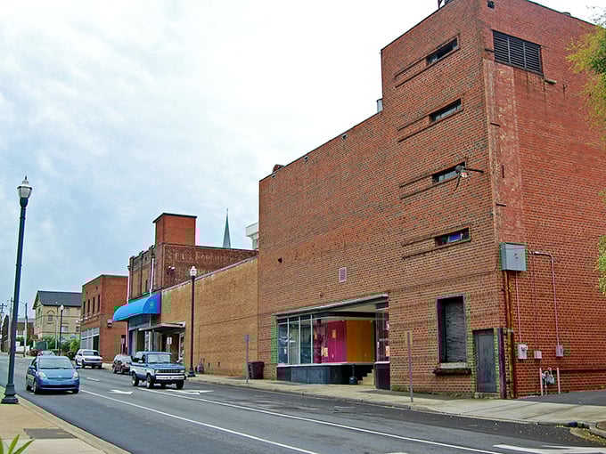 Classic downtown architecture tells stories of mountain heritage while modern life bustles through brick-lined streets.