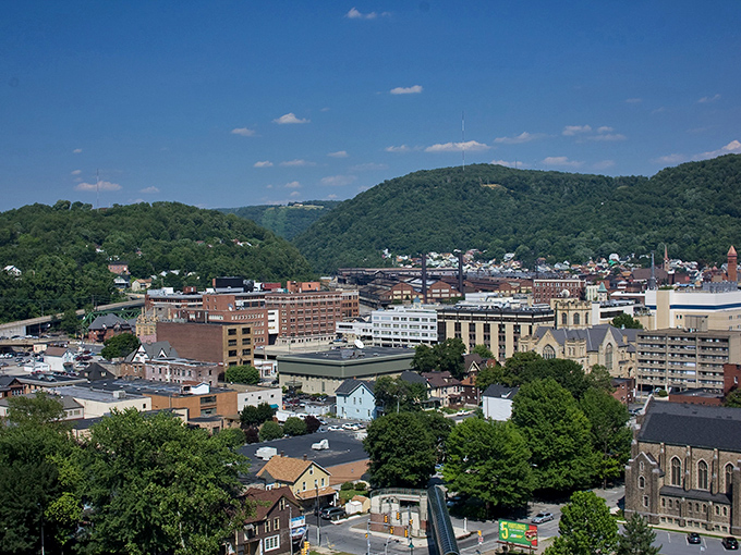 Johnstown's riverside buildings stand proud against the backdrop of rolling hills, offering retirees scenic views on a budget.
