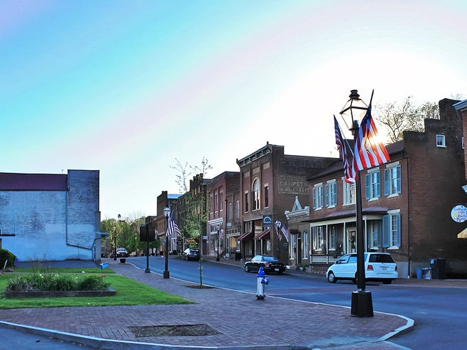 Jonesborough whispers stories through its brick facades, where American flags snap in the breeze like exclamation points at the end of history's sentences.
