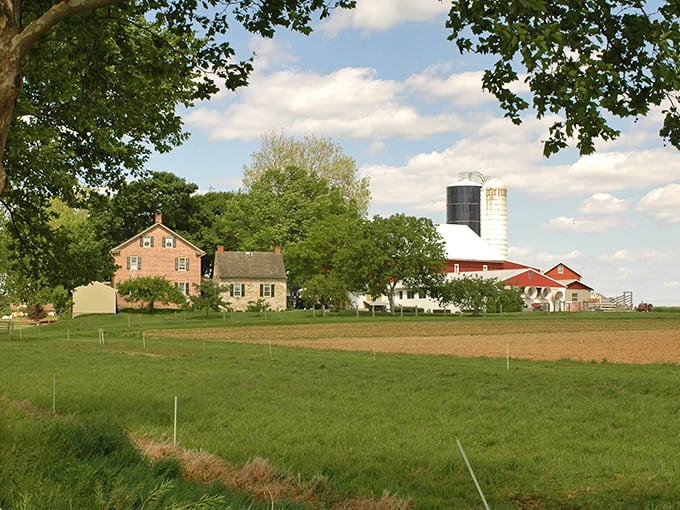 Red barn, brick farmhouse, green fields &ndash; it's like someone asked a kindergartener to draw the perfect farm. And nailed it!