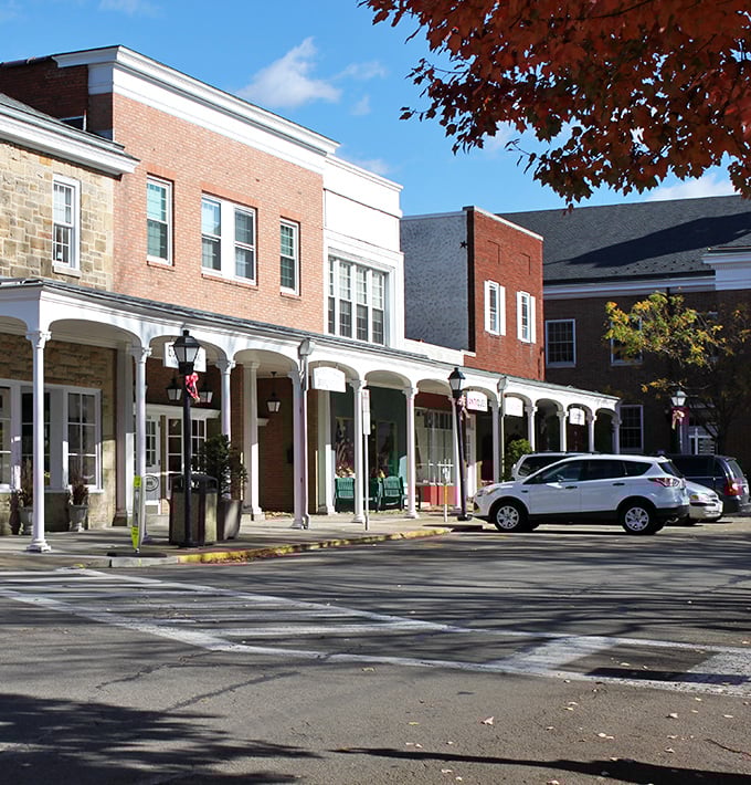 Ligonier's charming main street offers covered walkways perfect for window shopping, even when Pennsylvania decides to water the flowers.