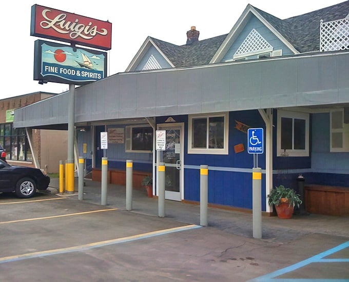 Luigi's cheerful blue exterior welcomes hungry visitors like an old friend. That sign promises "Fine Food & Spirits" &ndash; and it delivers!